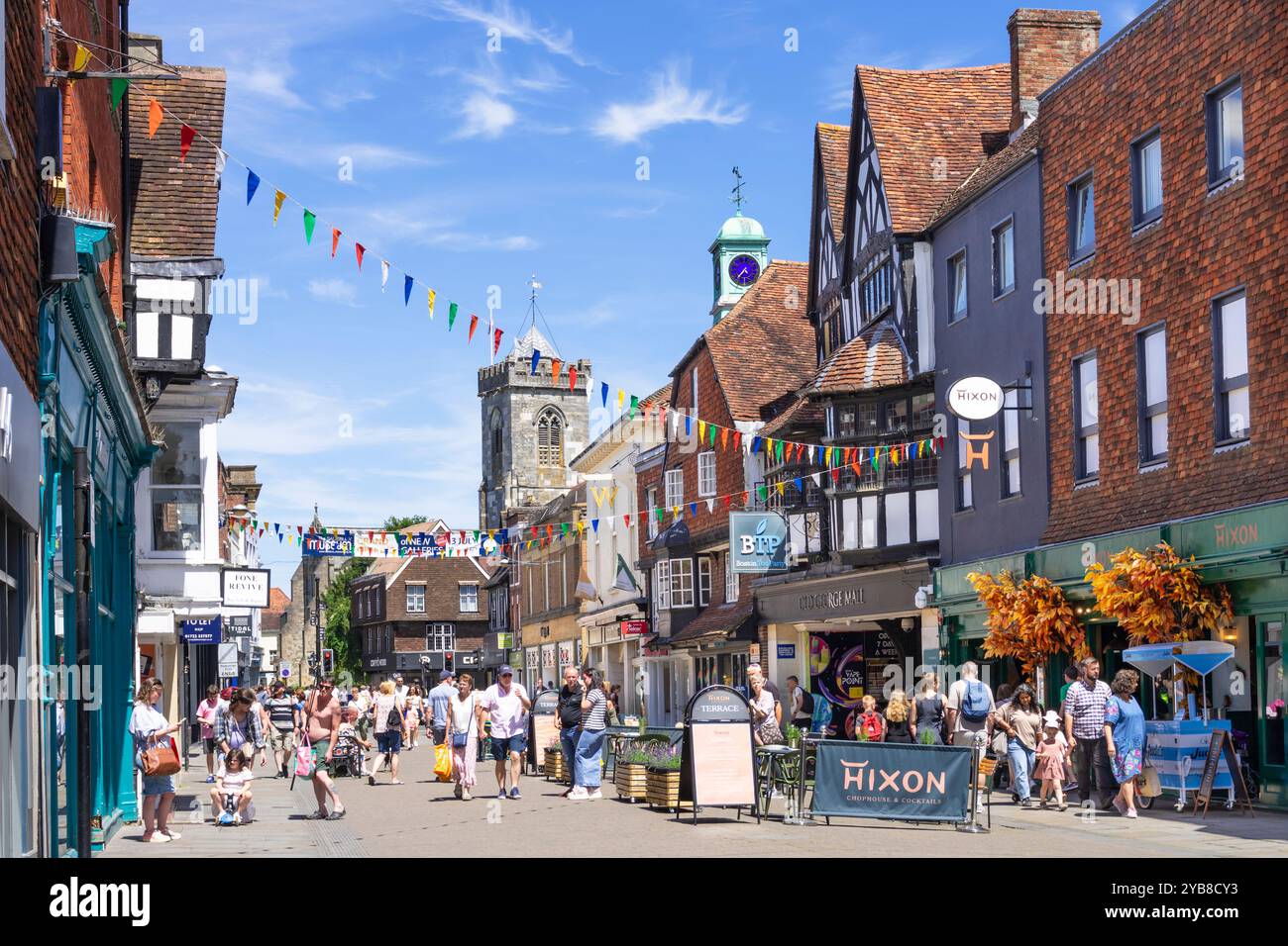Salisbury High street with people shopping in shops and cafes Busy High ...