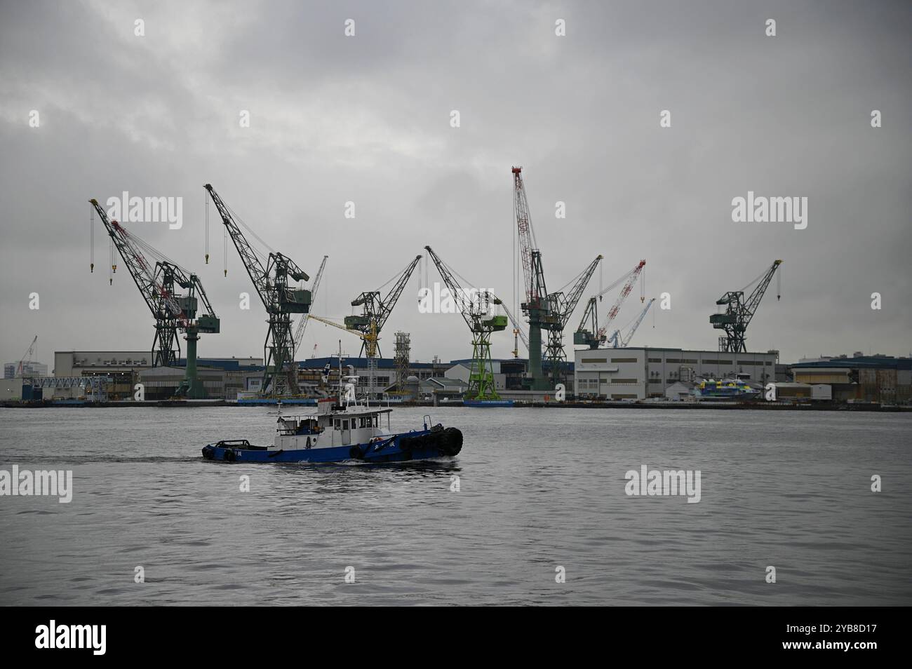 Scenic view of shipyard cranes at the maritime Port of Kōbe in the ...