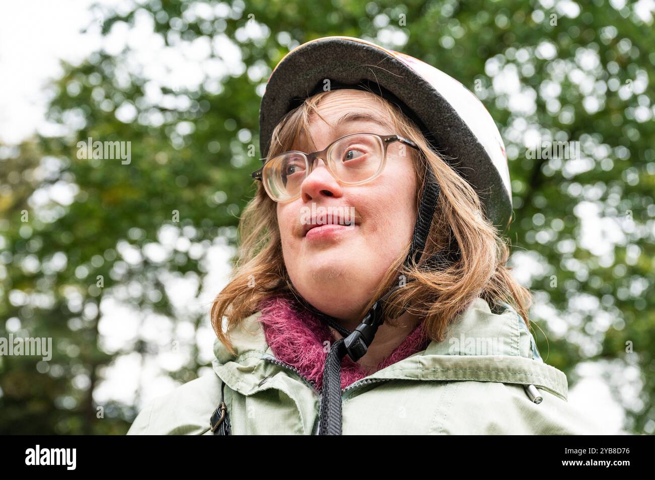 Outdoor portrait of a happy 42 yo woman with Down Syndrome, Tienen ...