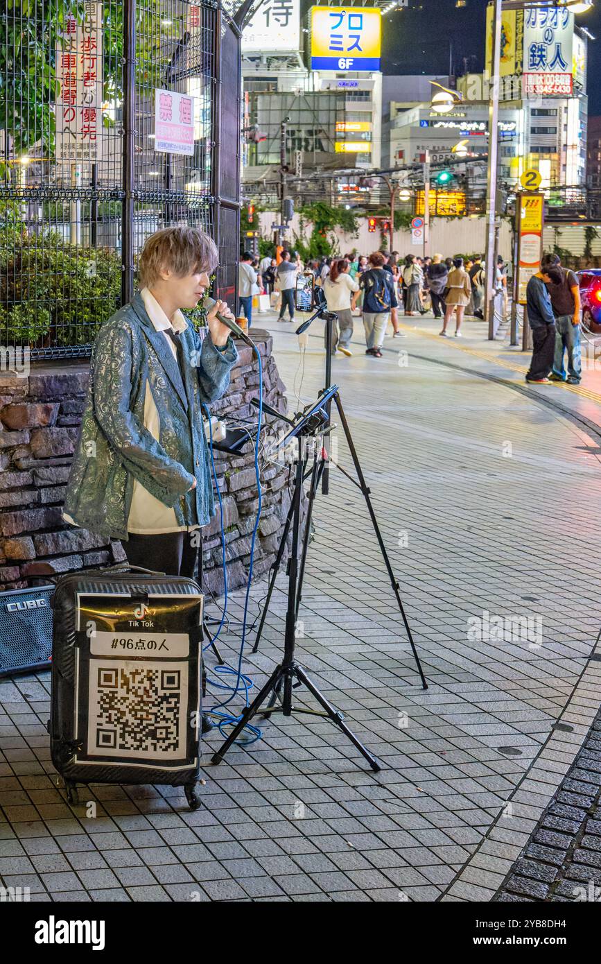 Japanese boy busker singing in Shinjuku, Tokyo, Japan on 23 September ...