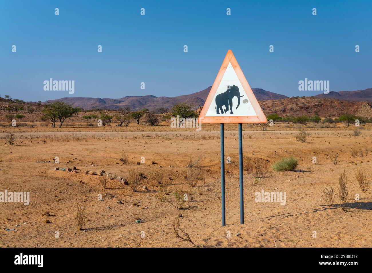 Elephant crossing, wildlife road sign and Damaraland landscape in ...