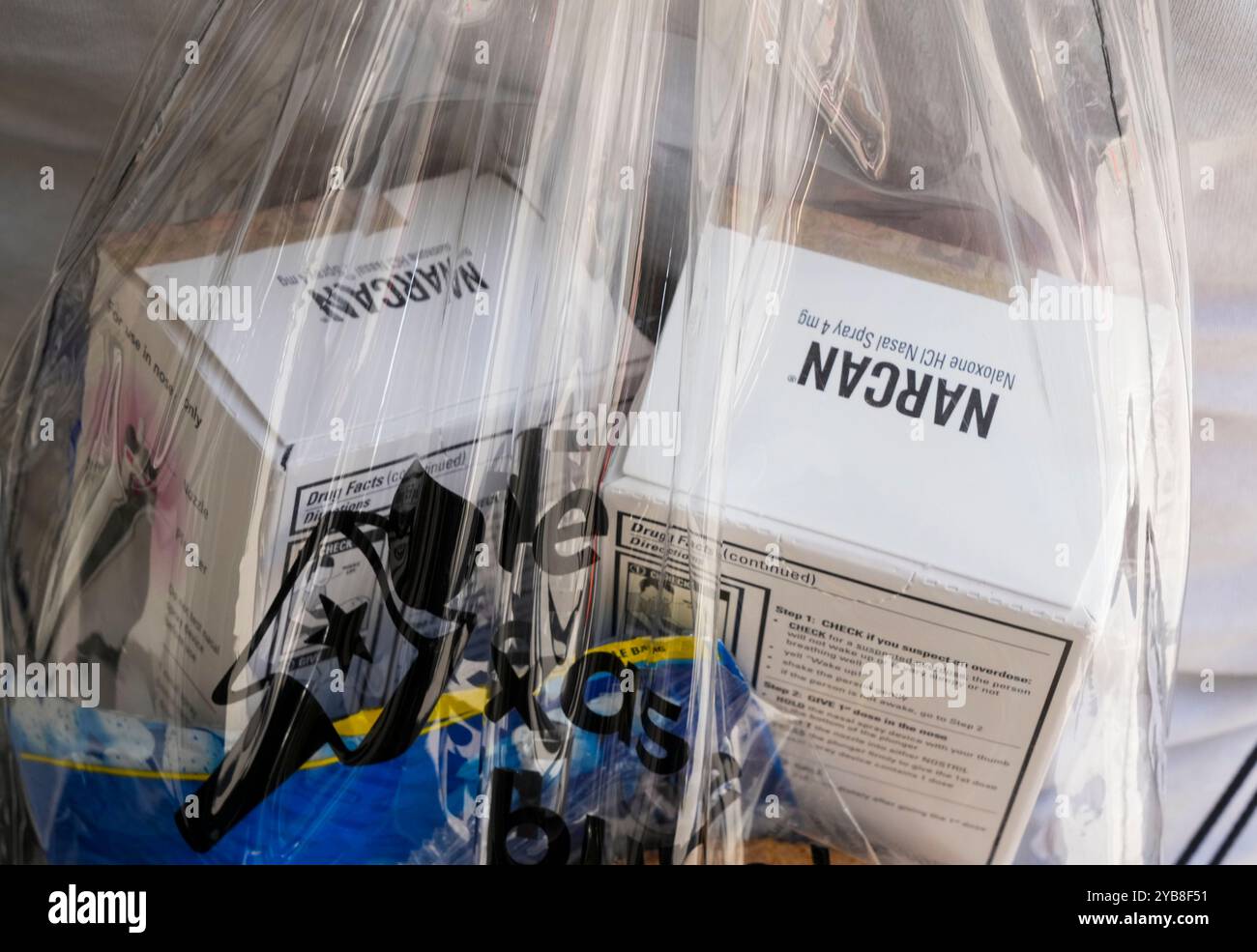 A clear backpack holding two packages of NARCAN (Naloxone HCl Nasal ...