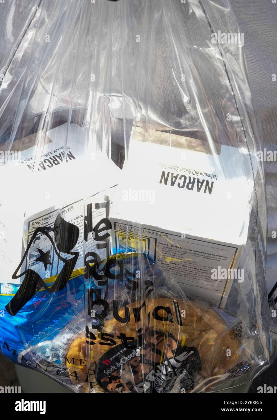 A clear backpack holding two packages of NARCAN (Naloxone HCl Nasal ...