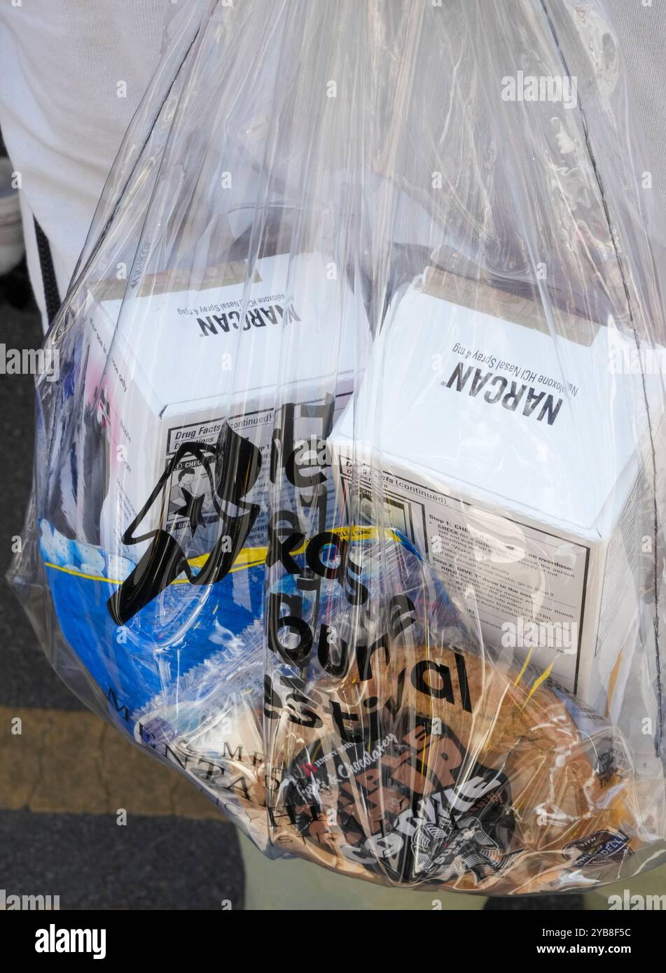 A clear backpack holding two packages of NARCAN (Naloxone HCl Nasal ...