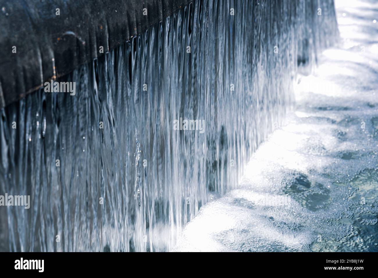 Part of the beautiful and big water fountain. Background with flowing ...