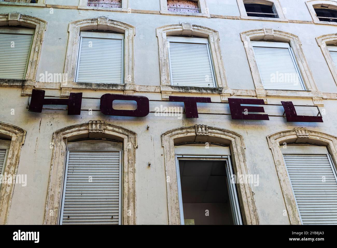 Sign of an old, closed and abandoned hotel in Carcassonne, France Stock ...