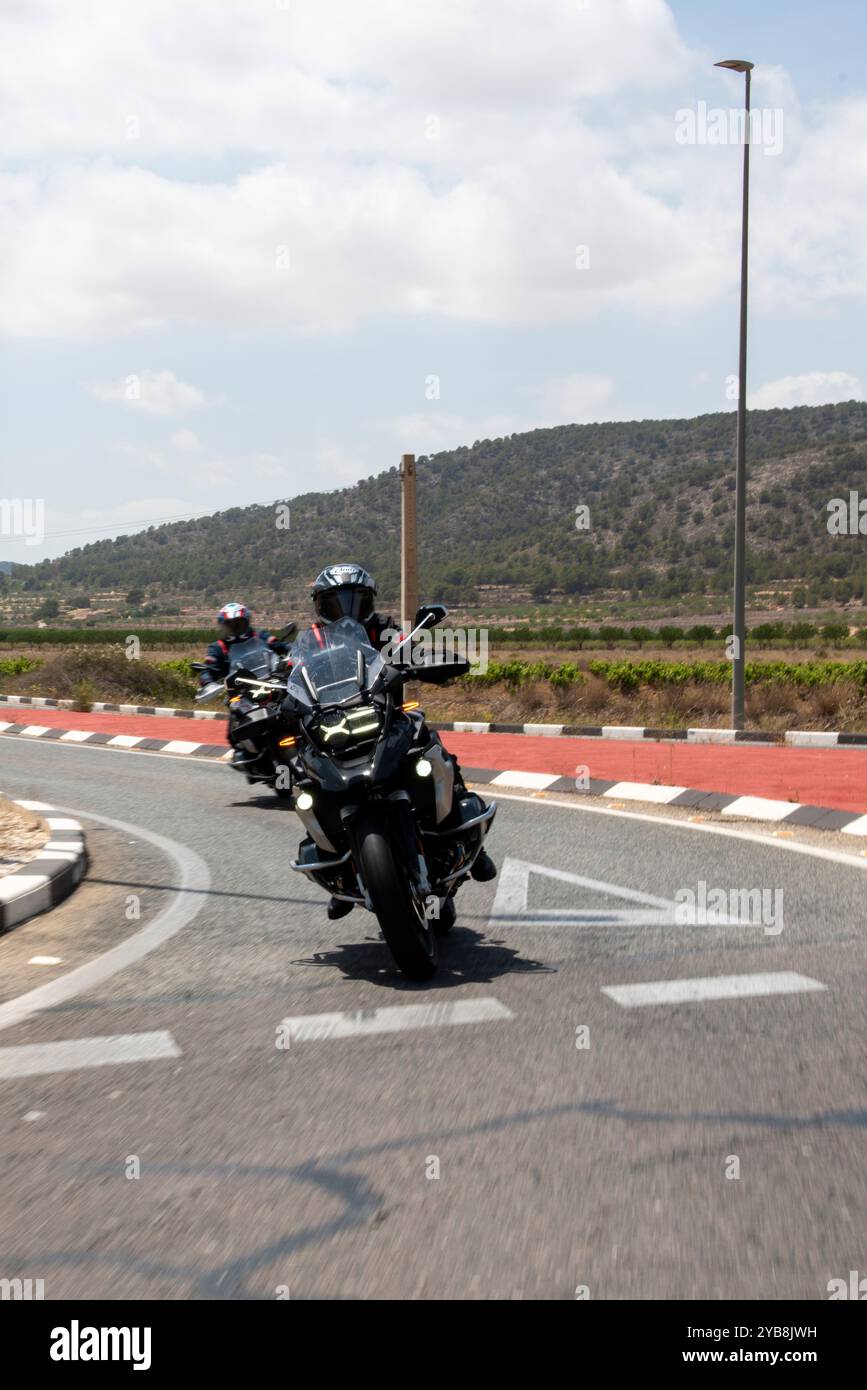 Riding a motorcycle on the open road Stock Photo - Alamy