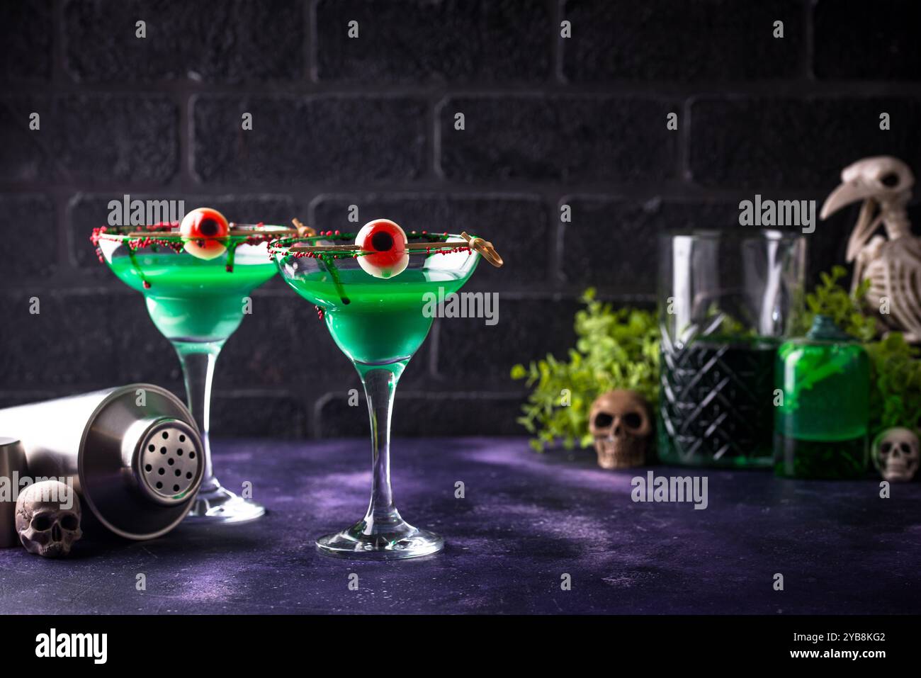 Spooky green halloween cocktails with eyeballs Stock Photo - Alamy