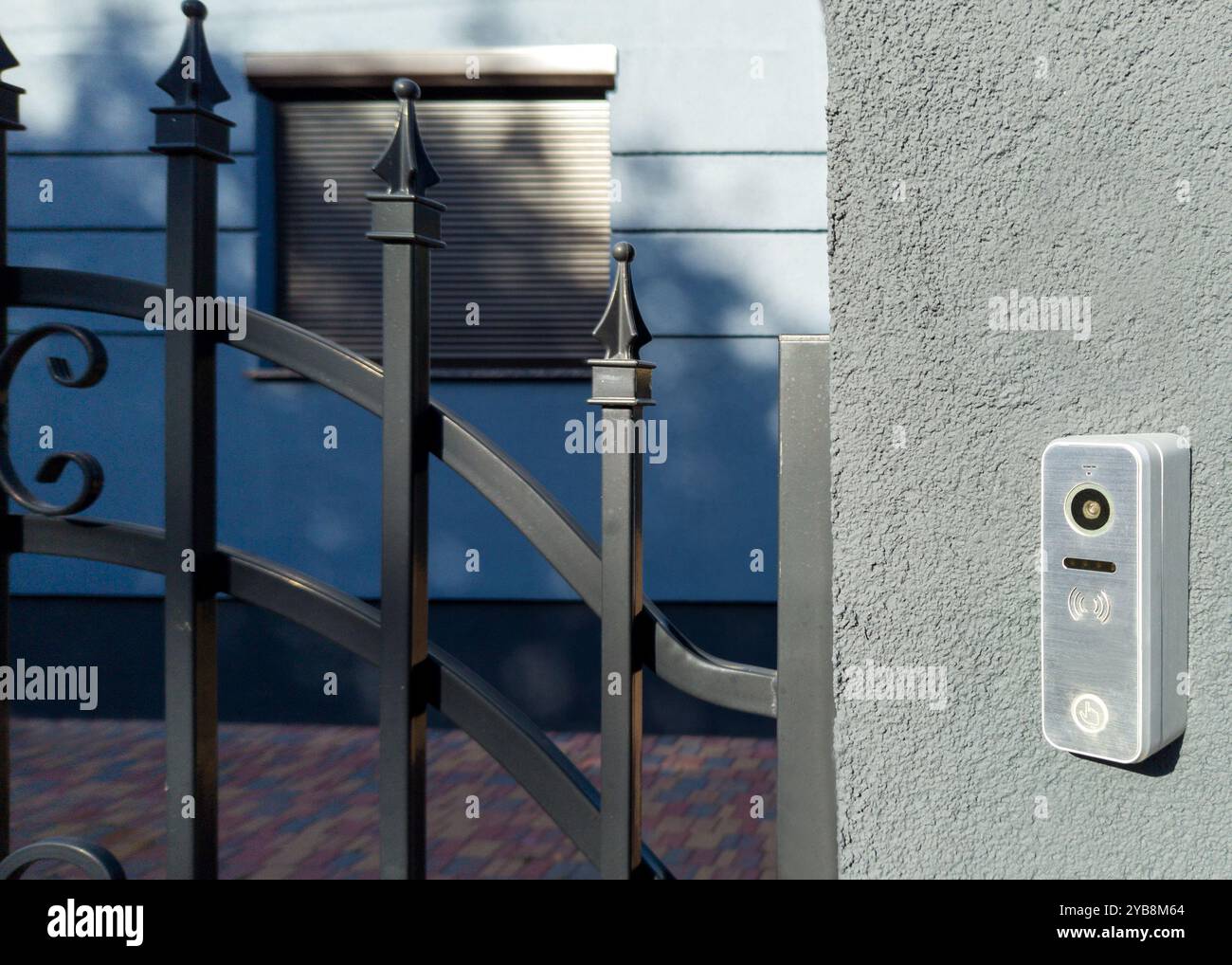 Modern Gate with Doorbell Camera Stock Photo - Alamy