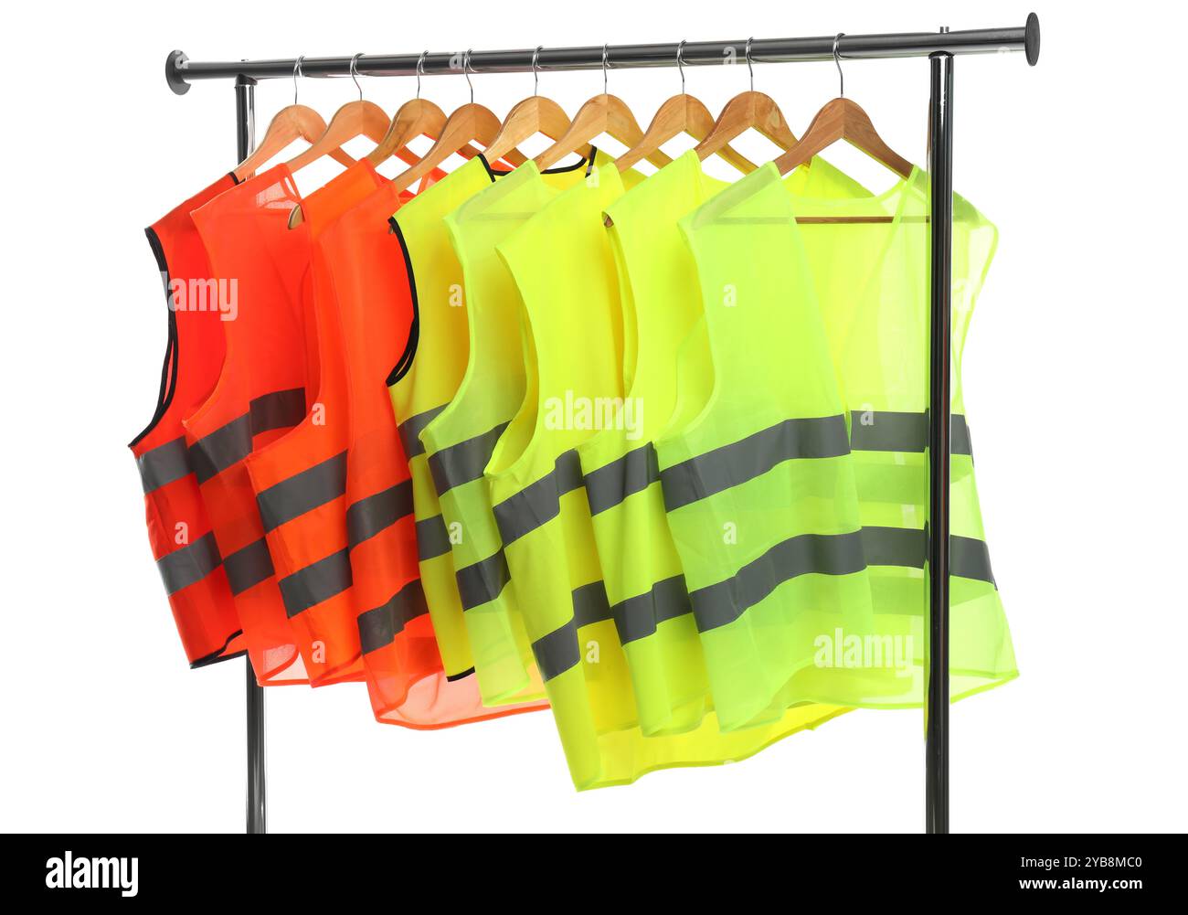 Different bright reflective vests on clothing rack isolated on white ...