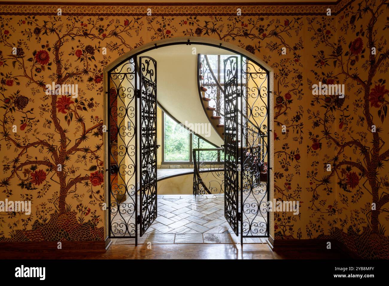 Wrought iron gates looking through to the front foyer and main ...