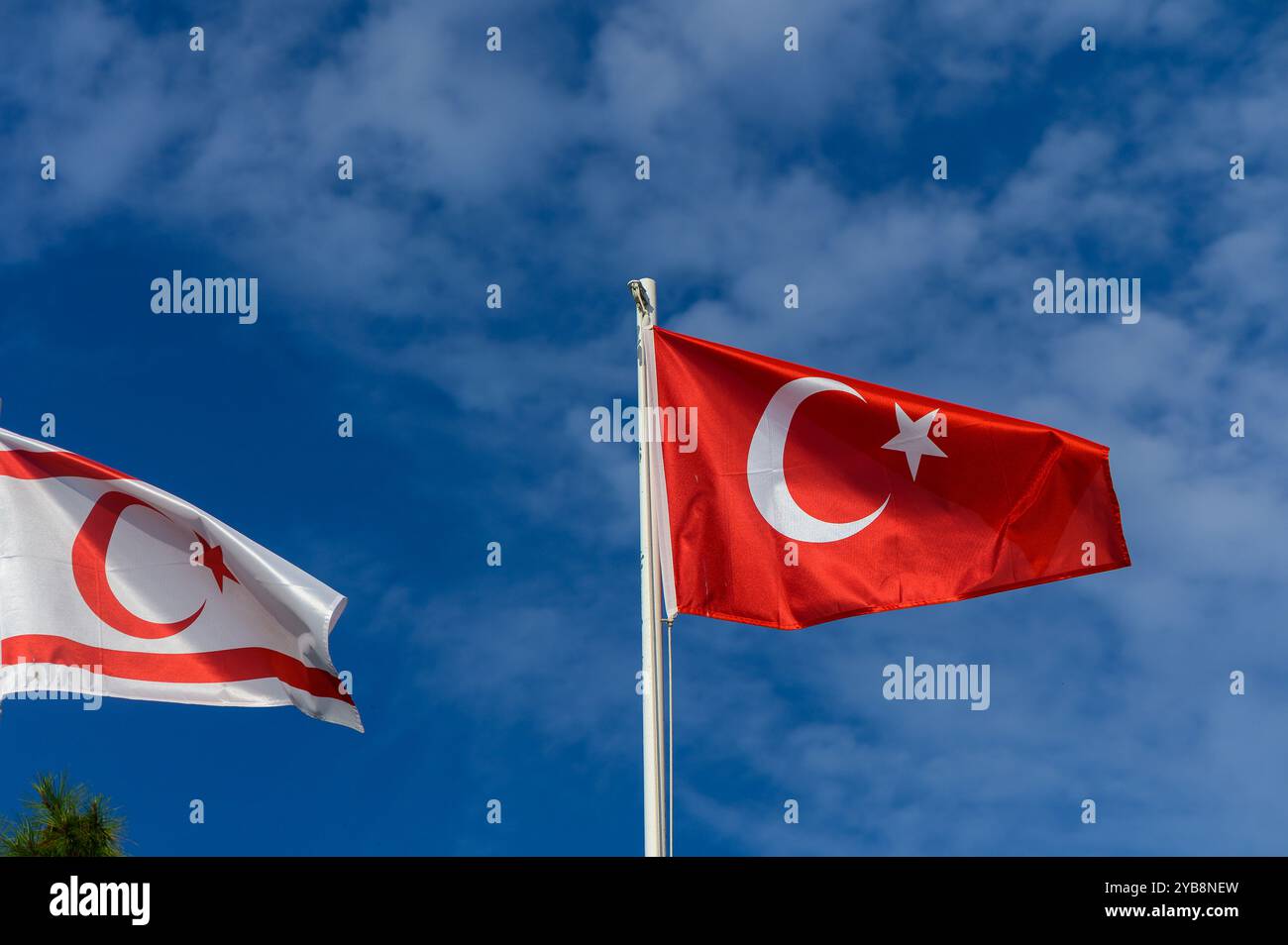 The Turkish national flag flutters in the wind, showcasing its iconic ...