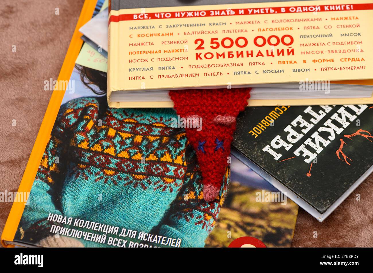 A vibrant display of various books features intricate designs and a ...