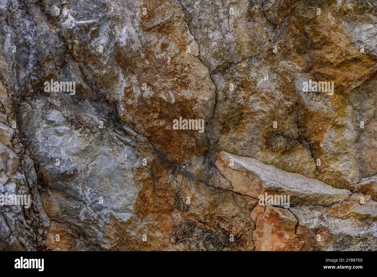 A close-up view reveals a textured surface of natural stone, showcasing ...