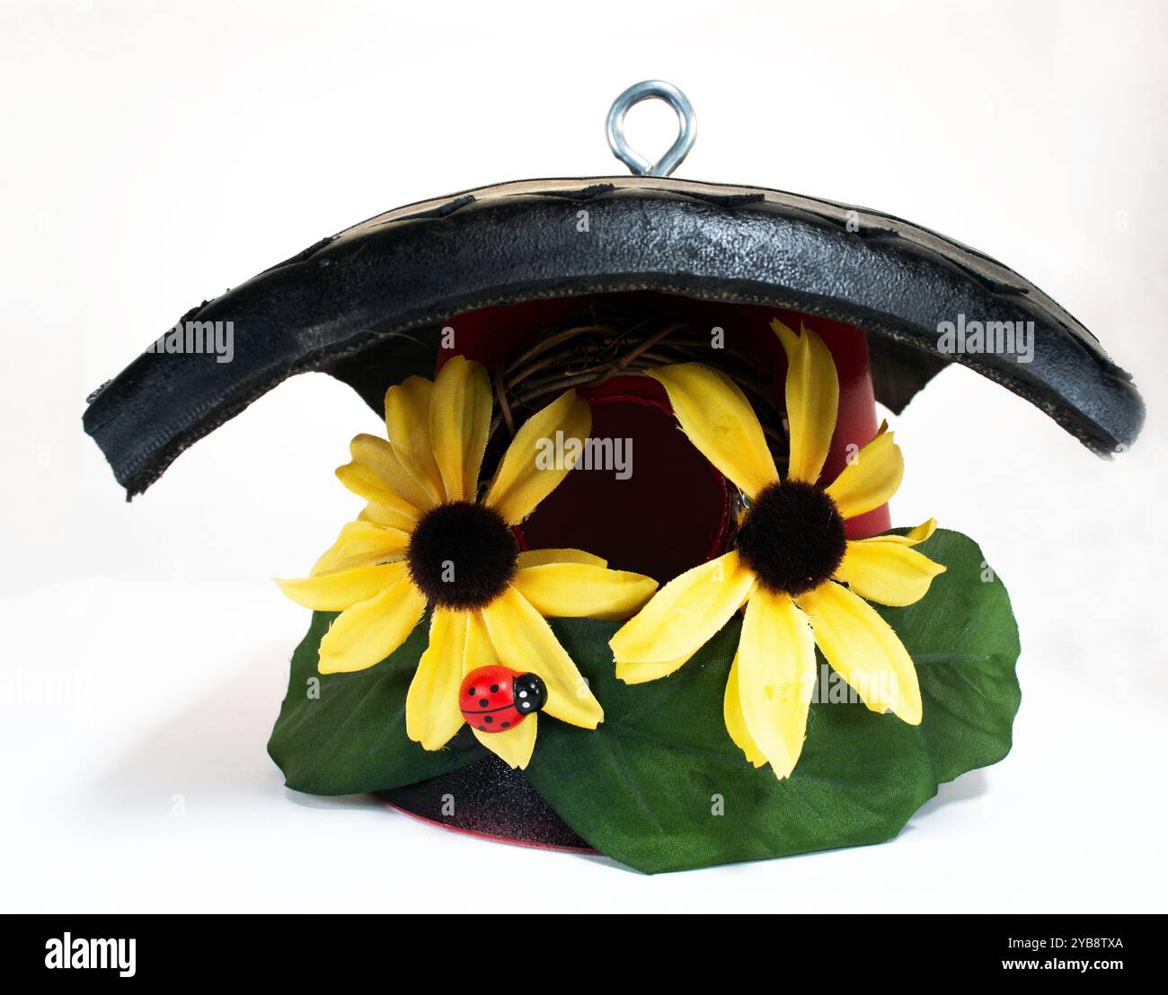 Roughly cut piece of rubber tire tread with bright yellow artificial ...