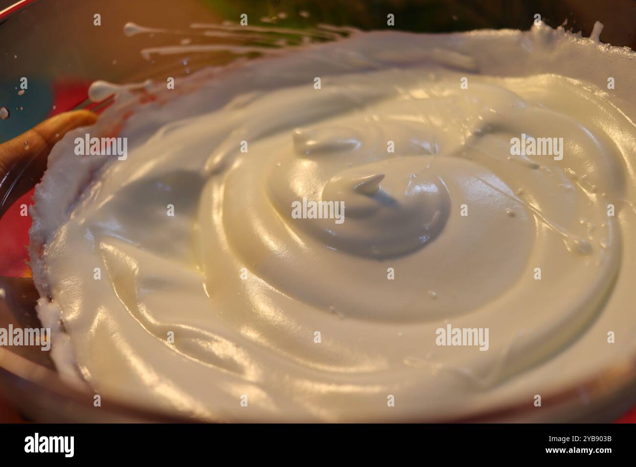 Smooth and Creamy Homemade Whipped Cream in Mixing Bowl Stock Photo - Alamy
