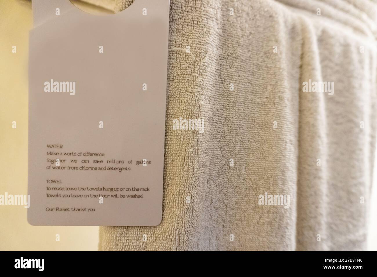 Save water sign label on hotel encourage guest reuse bath towel Stock ...