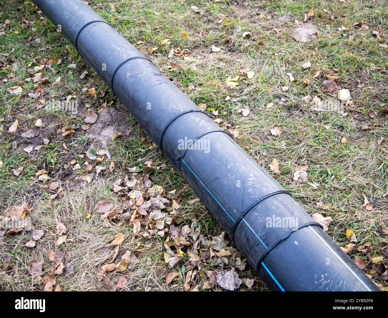 Plastic main pipe welded from scraps Stock Photo - Alamy