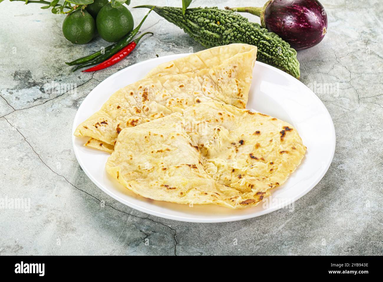 Indian cuisine tandori bread - naan with cheese Stock Photo - Alamy