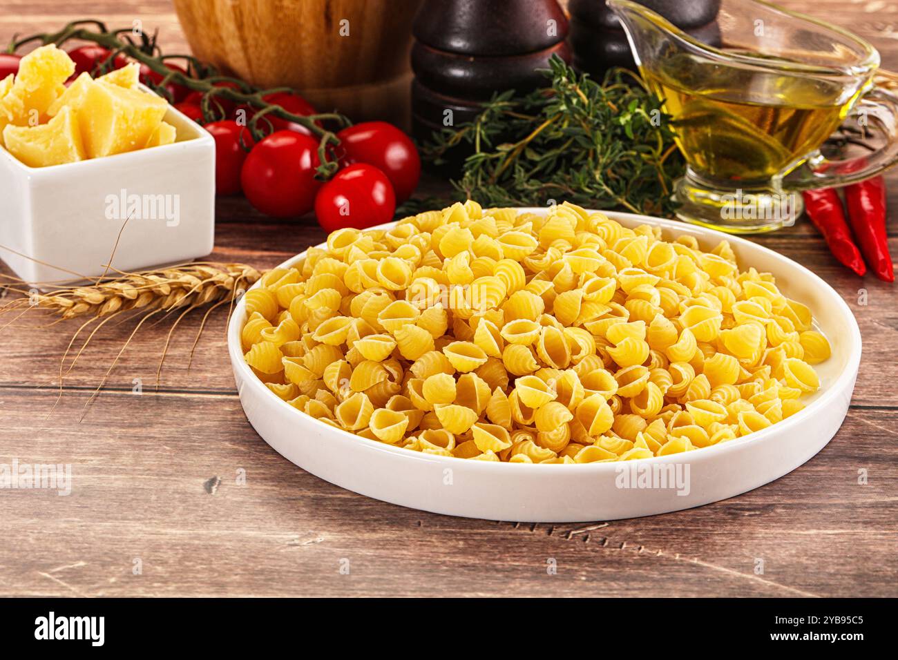 Italian cuisine - dry conchiglie shell pasta Stock Photo - Alamy