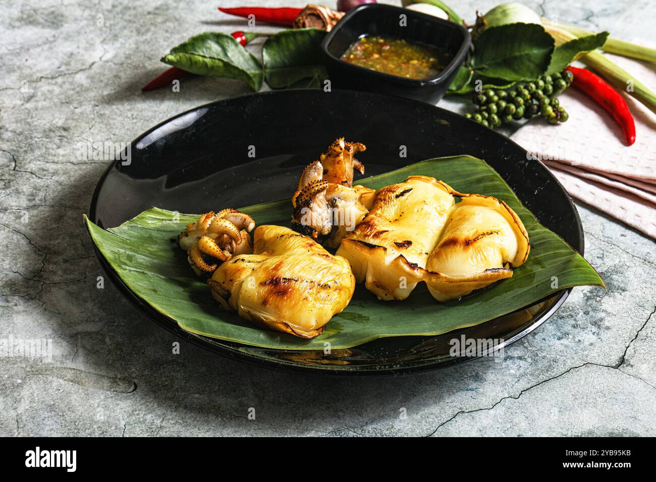 Delicous Grilled cuttlefish with sauce asian style Stock Photo - Alamy