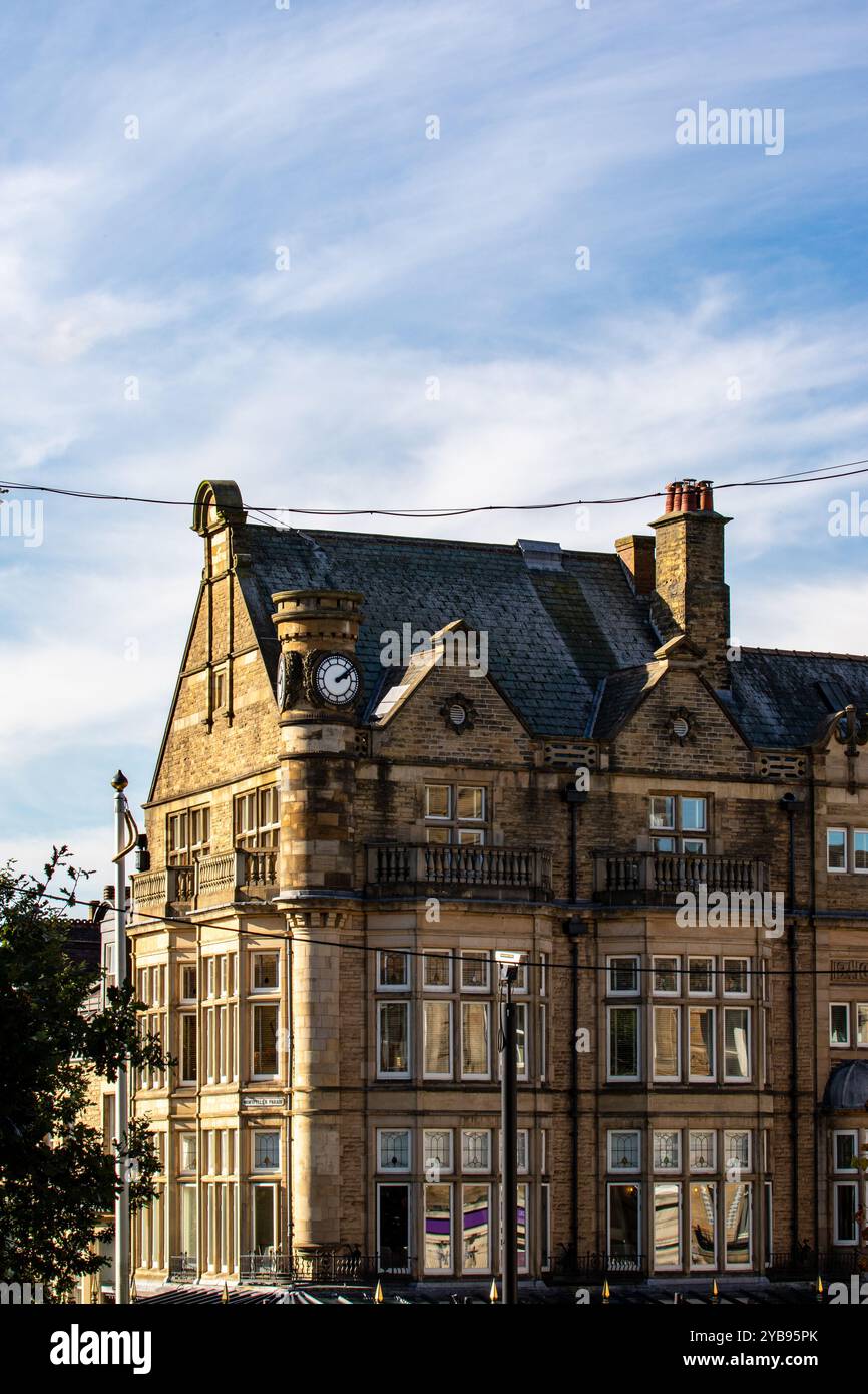 A historic building with a clock tower, featuring ornate architectural ...