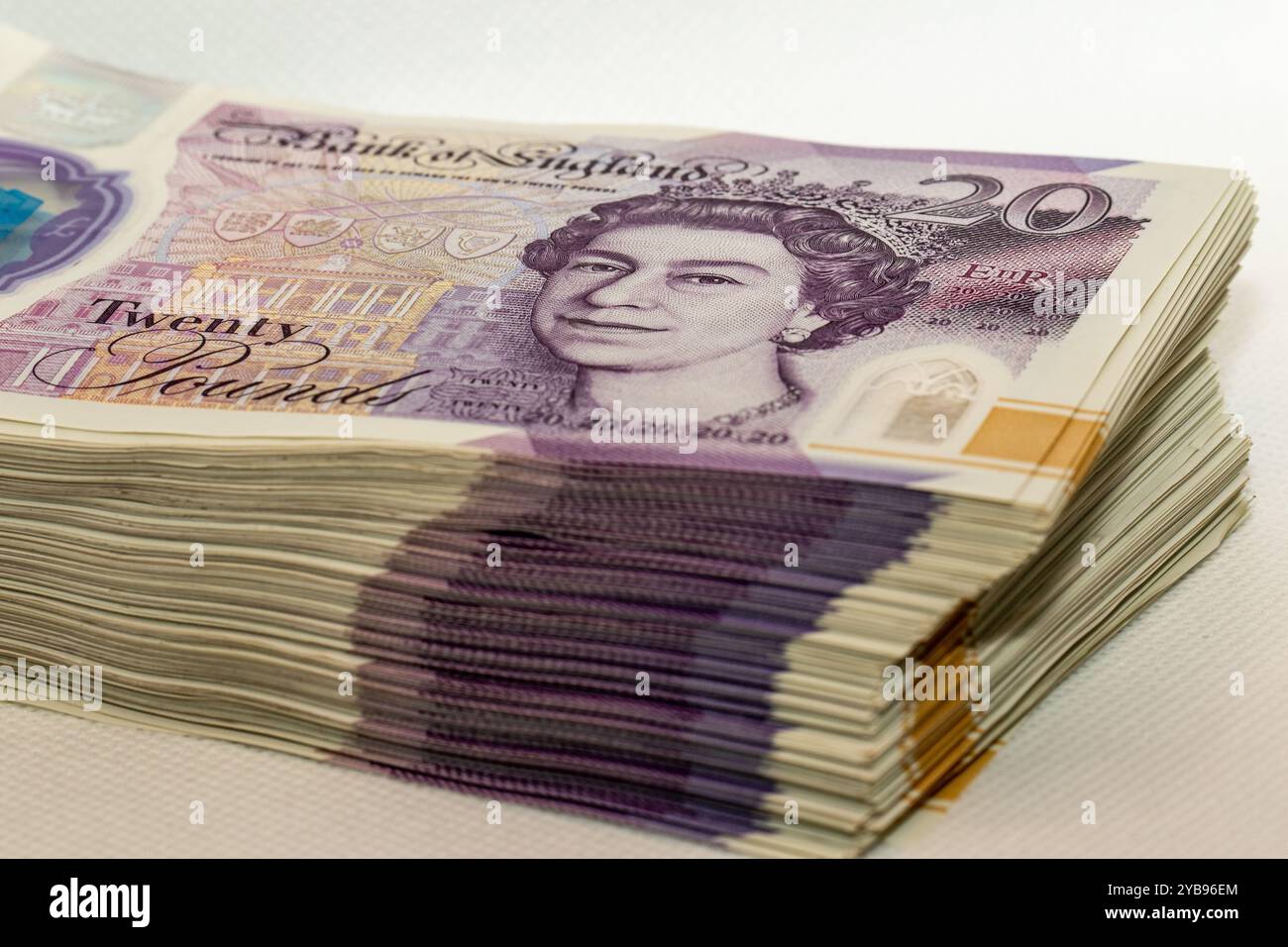 A neat stack of twenty pound banknotes from the Bank of England ...