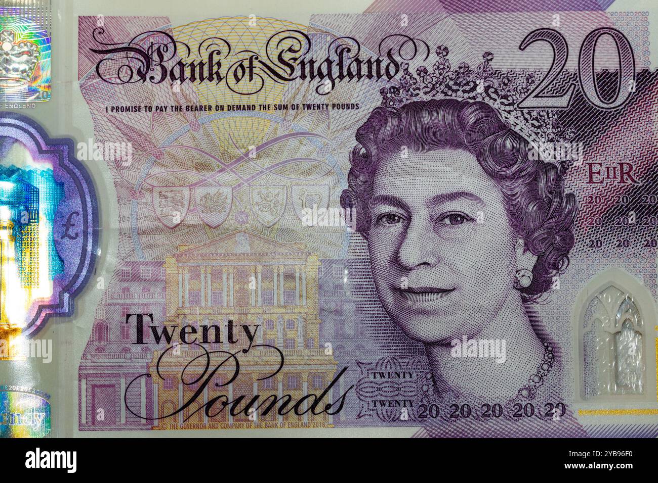 Close-up of a British twenty-pound banknote featuring a portrait of ...