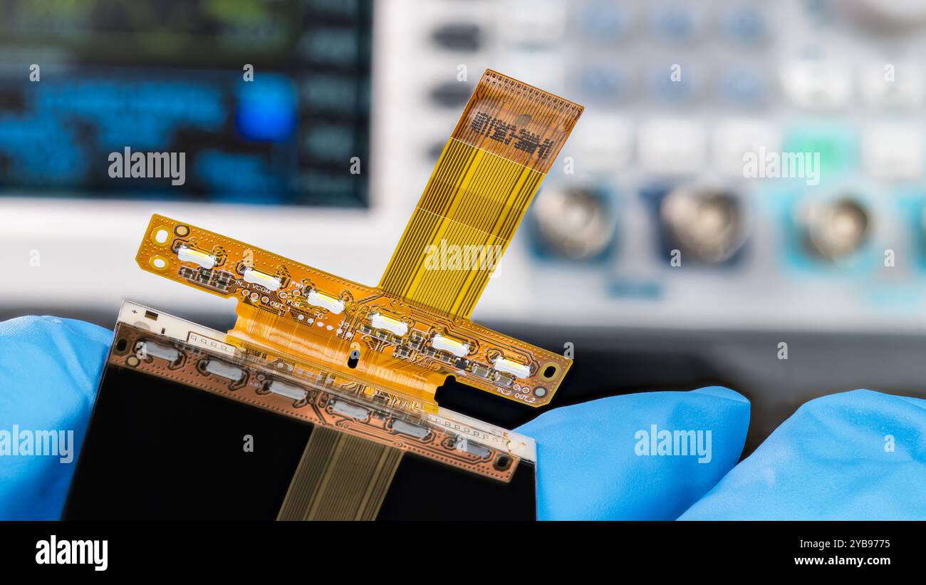 Close-up a mobile phone flex printed circuit with flat cable in ...