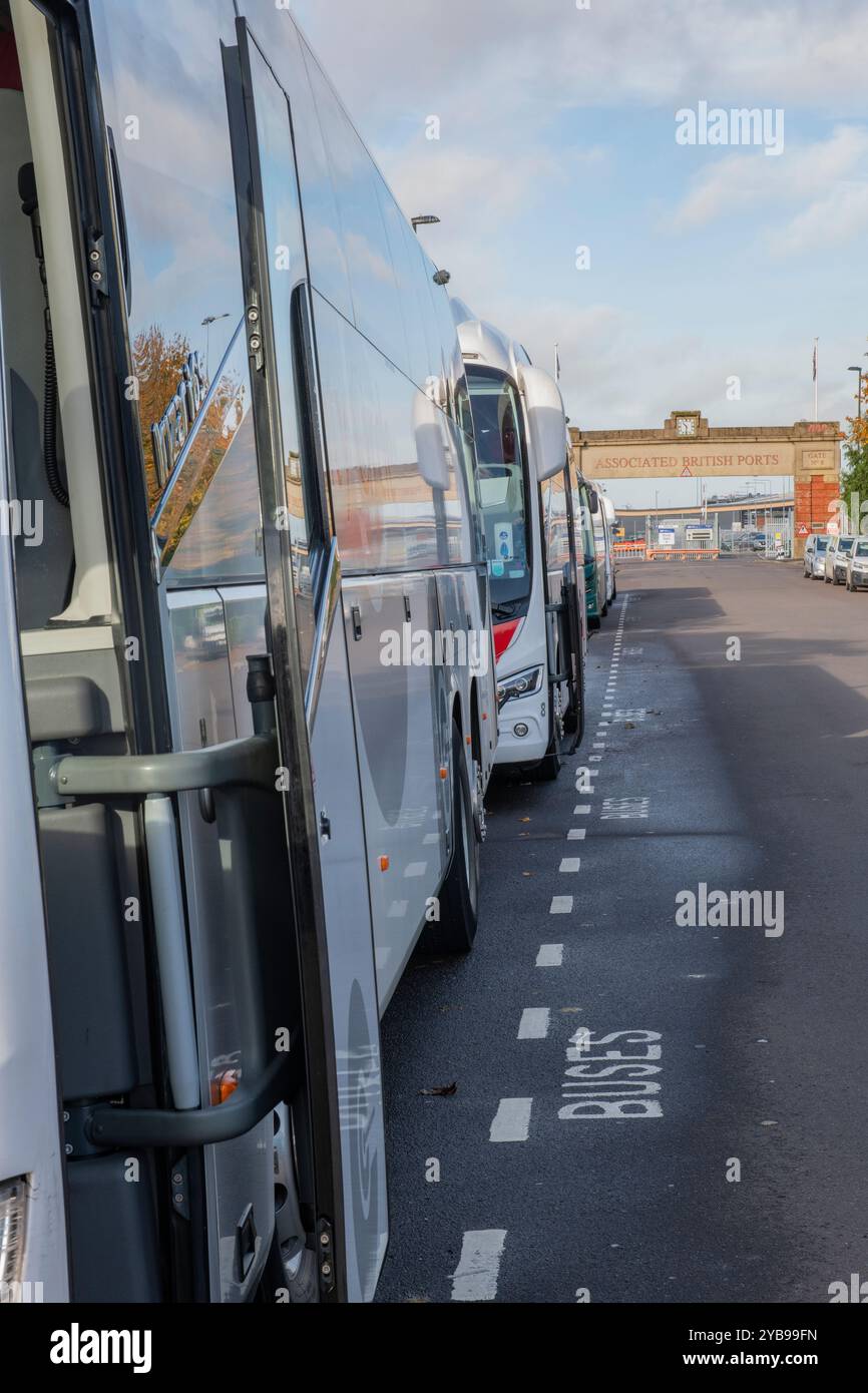 line of coaches and busses parked outside of the ocean cruise terminal ...