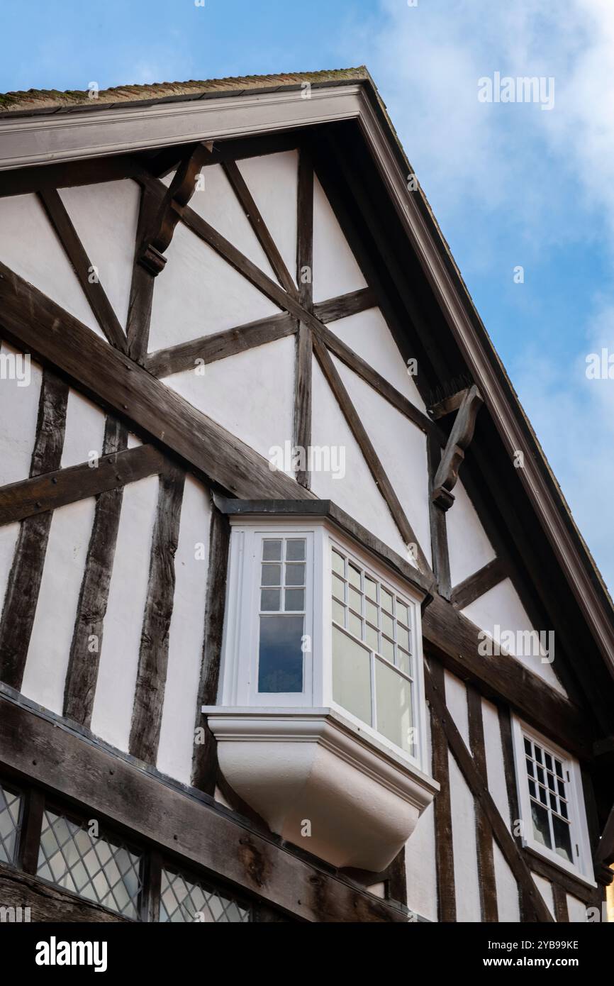 Gable end and mullioned bay window on the overhanging section or jetty of the |Tudor house ...