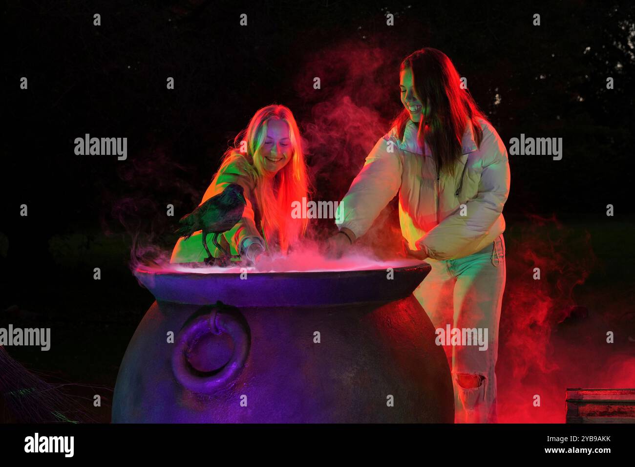 Women discover installations during a media preview event of a new ...