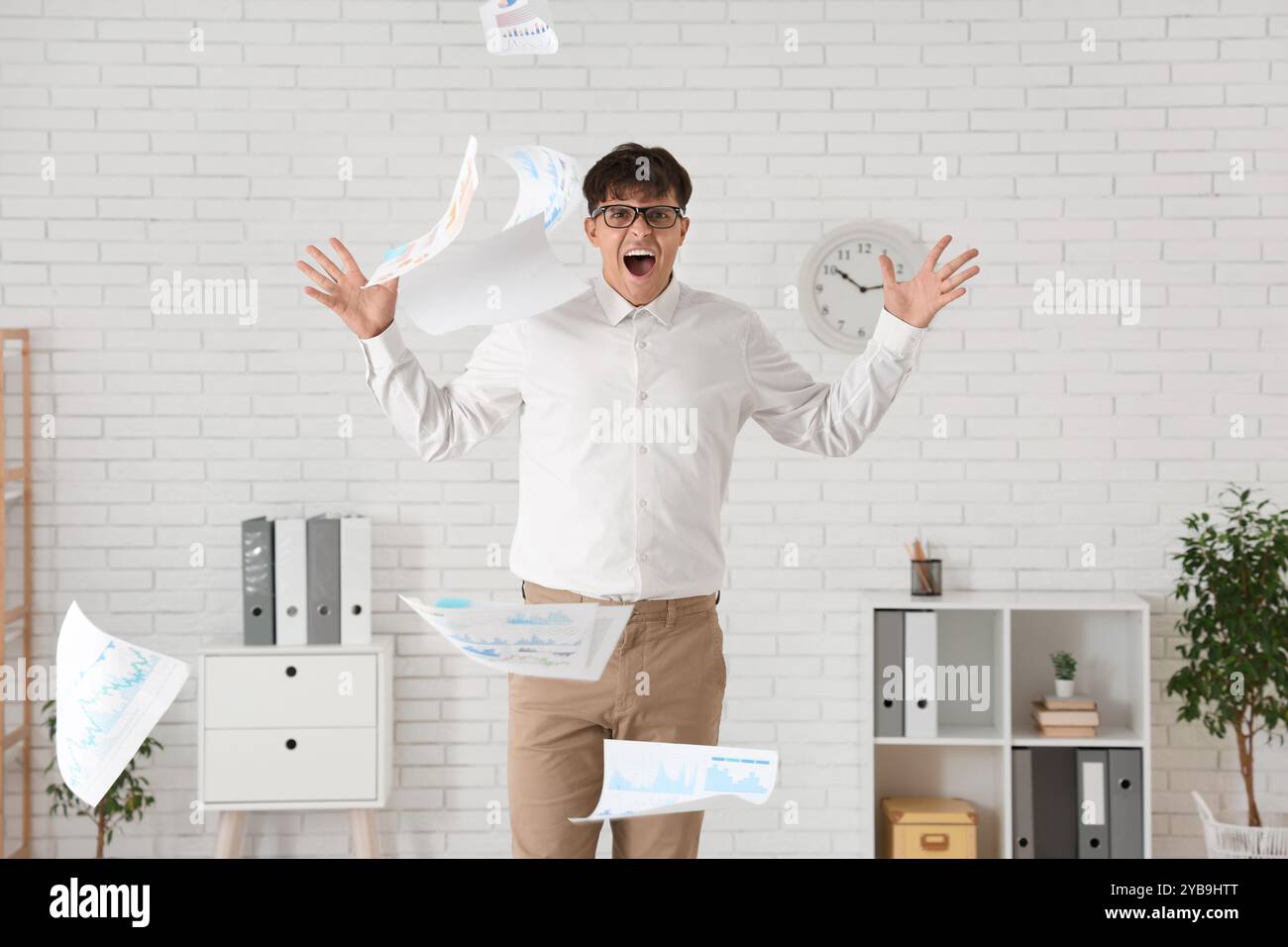 Angry businessman throwing papers hi-res stock photography and images ...