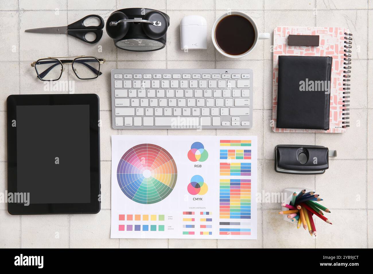 Workplace of graphic designer with keyboard, laptop computer and color ...