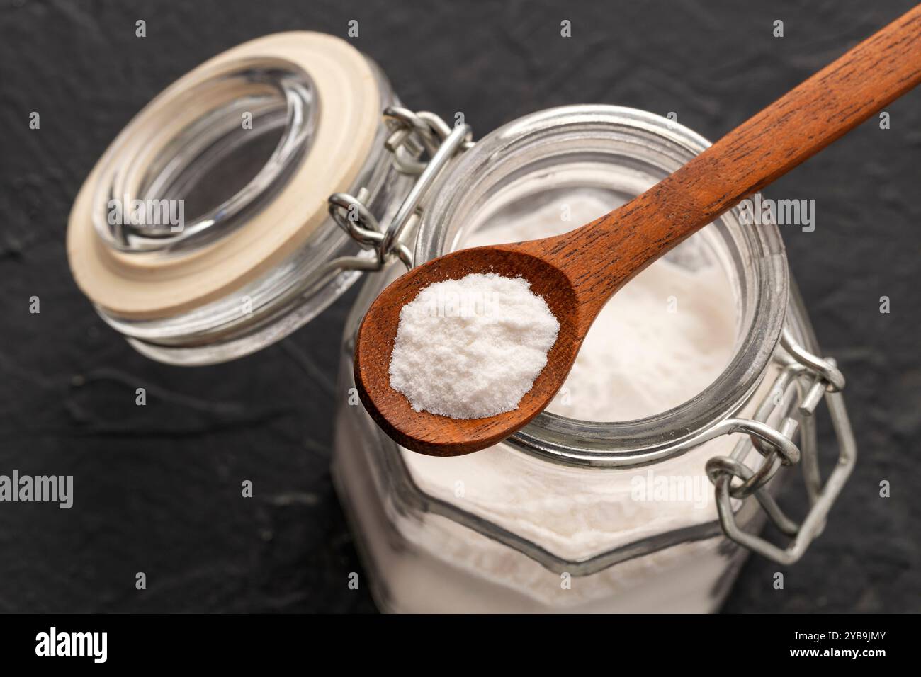 Baking soda - Crystalline solid compound in the glass jar and spoon ...
