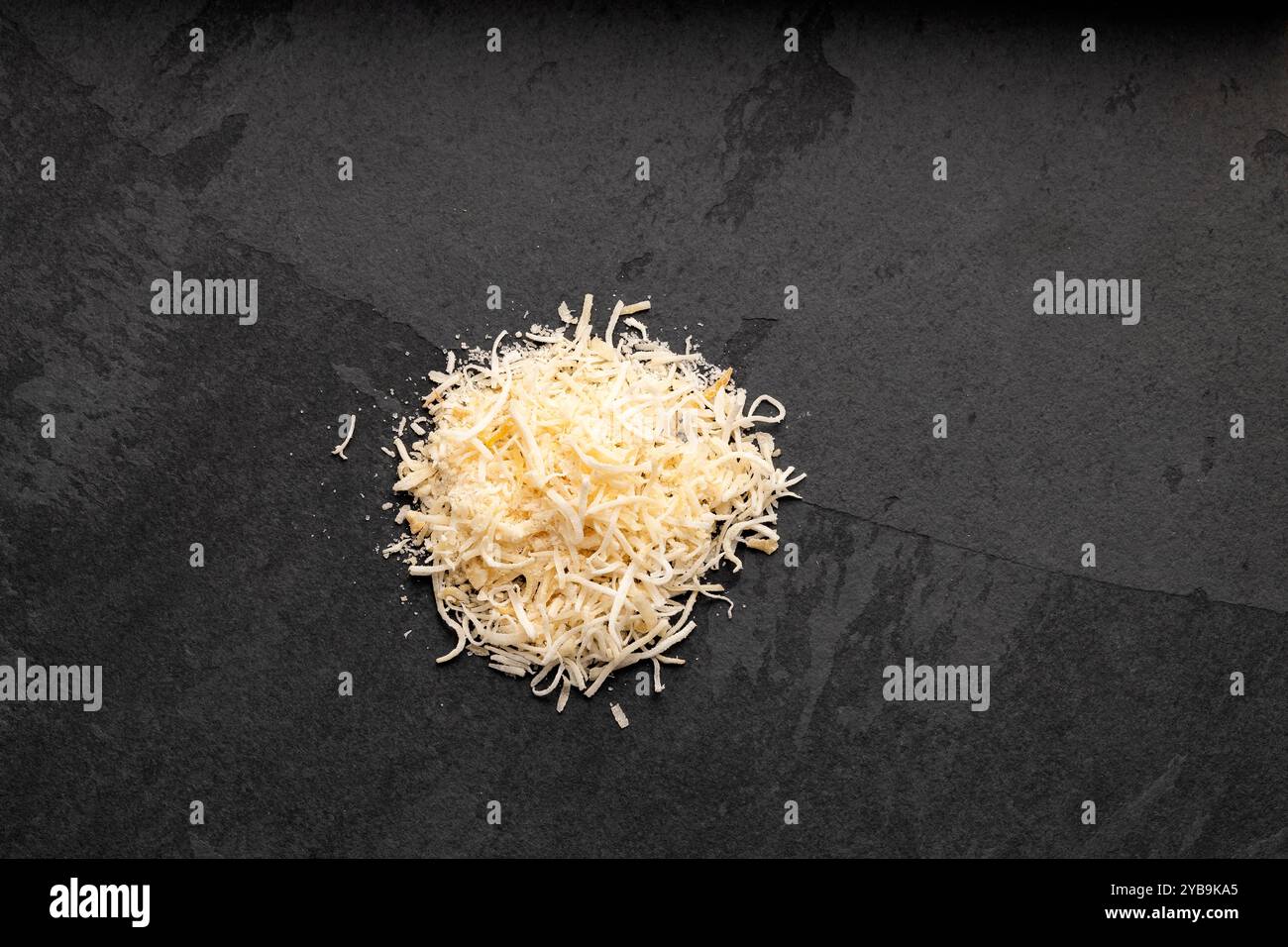 Pile of dehydrated shredded coconut with sugar - Cocos nucifera Stock ...