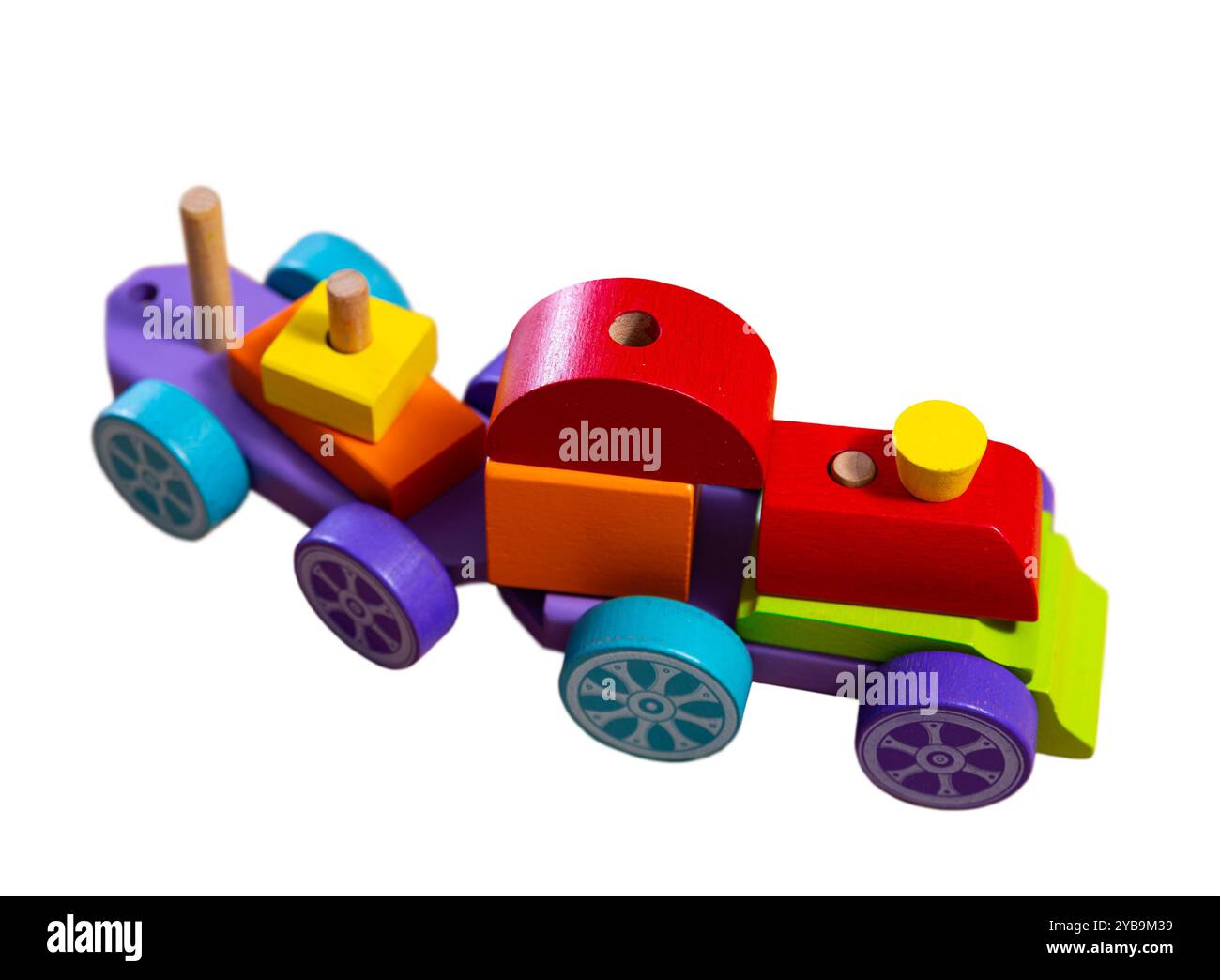 Colorful wooden toy stacking train with wagons from blocks Stock Photo ...
