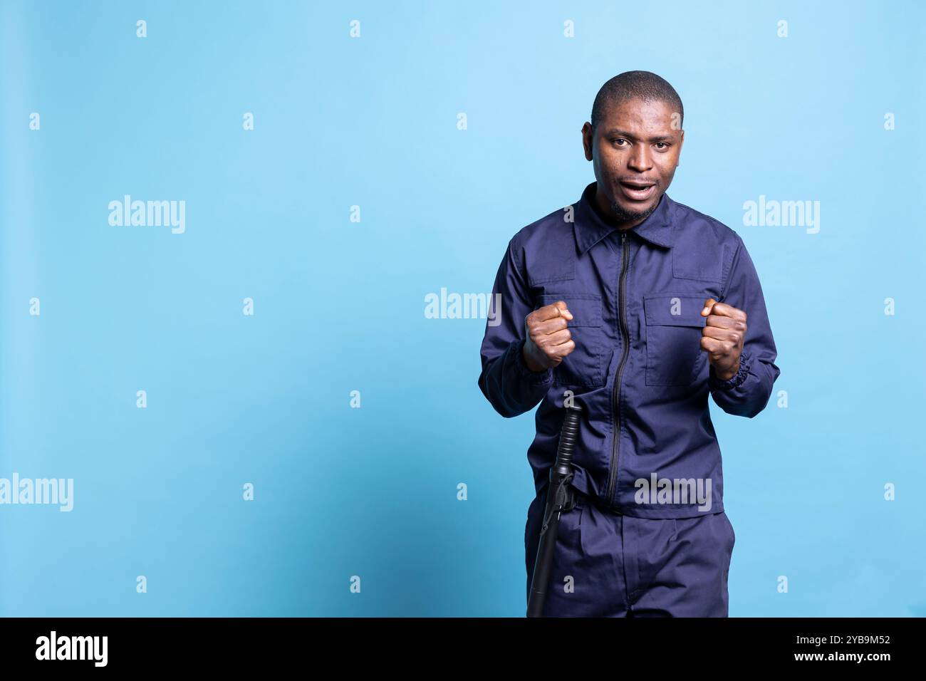 Happy security guard cheering hi-res stock photography and images - Alamy