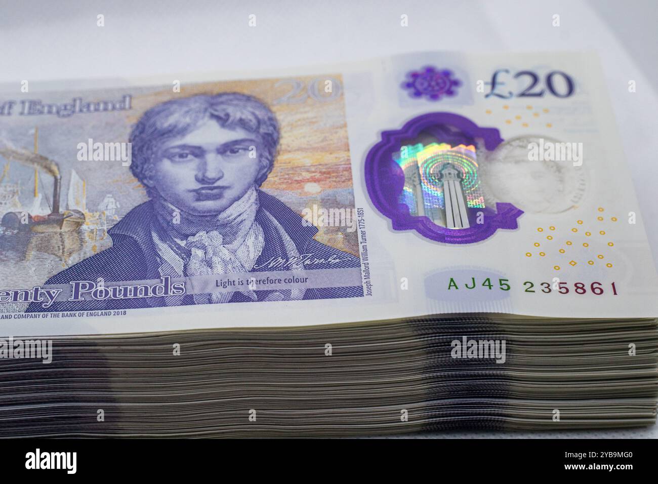 A stack of British £20 banknotes, showcasing the front design featuring ...