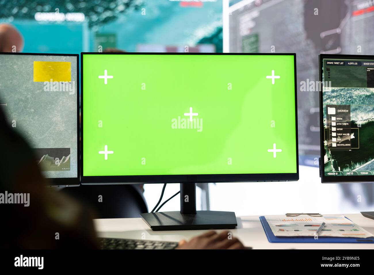 Recruit operates on reconnaissance CCTV footage with green screen ...