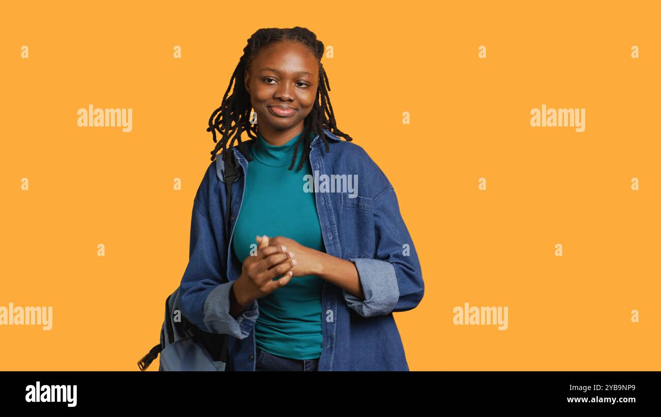Thrilled young girl doing happy dance, feeling jolly, isolated over ...