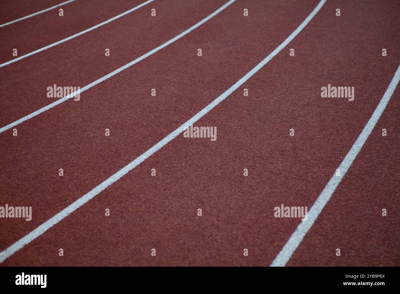 Red rubber track and field lines, lanes background texture Stock Photo ...