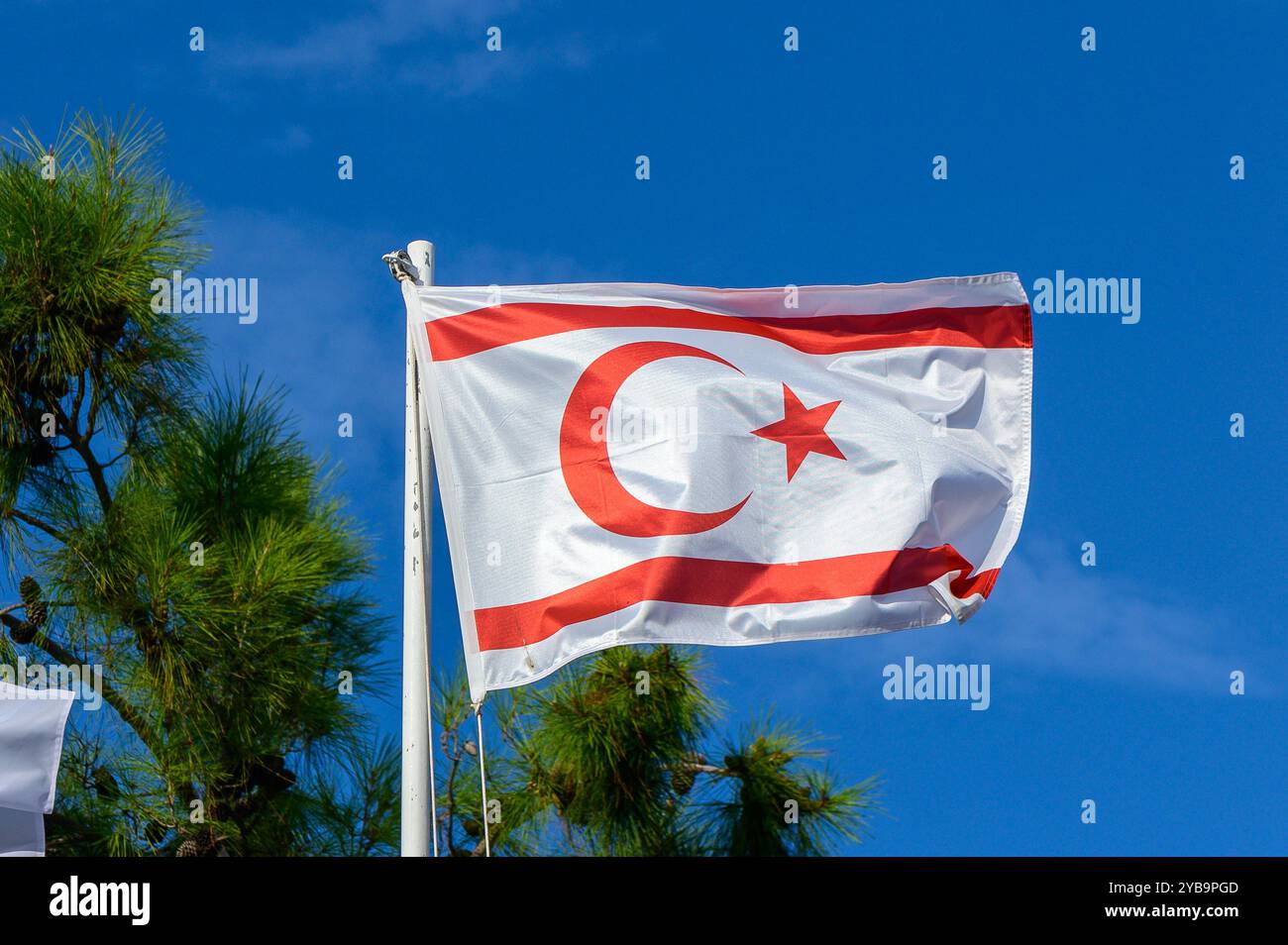 A striking display of the Northern Cyprus flag flutters in the gentle ...