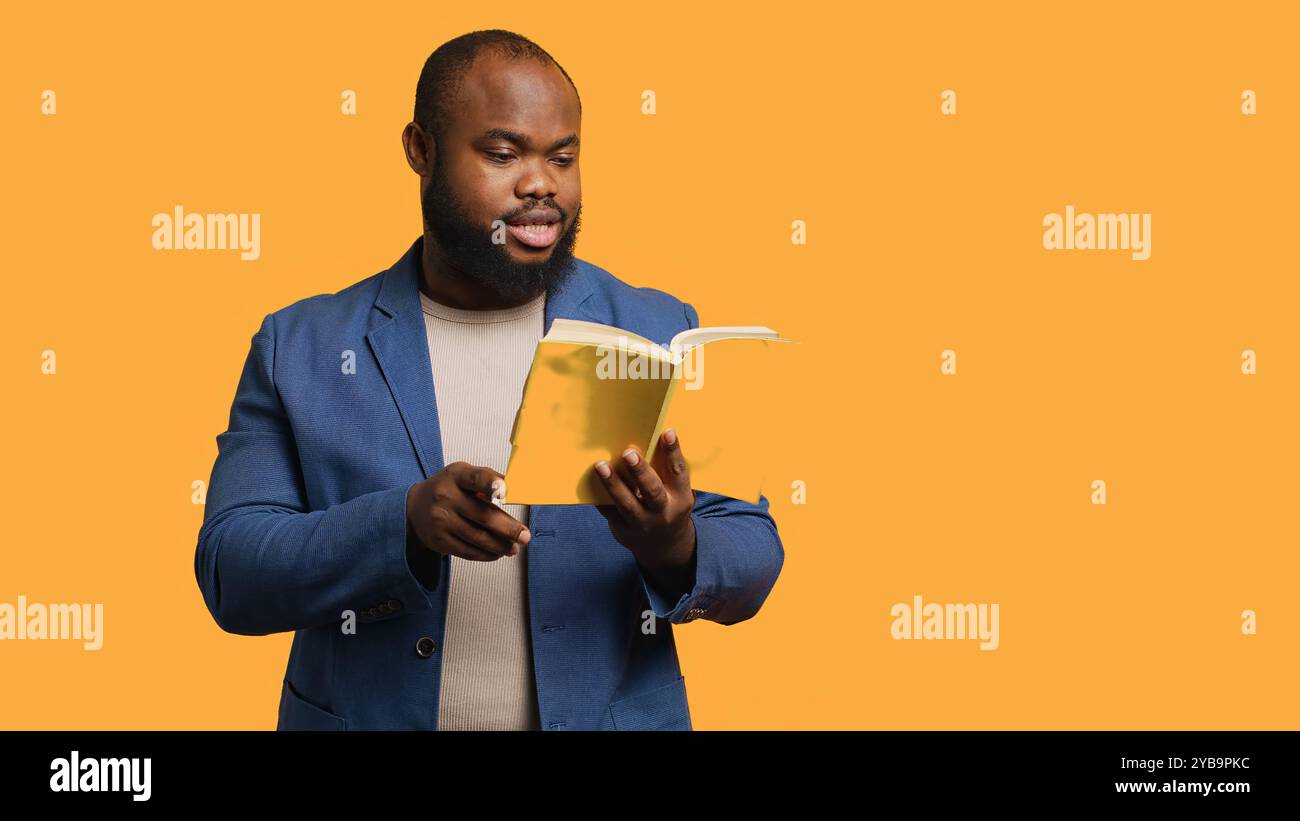 African american orator reading book aloud, narrating story for ...