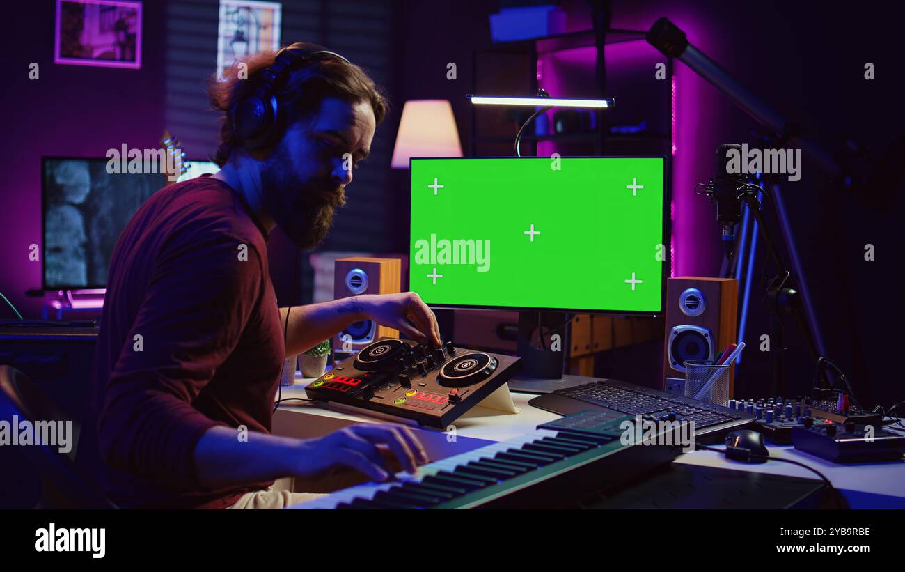 Music producer songwriter mixing piano key notes in home studio ...