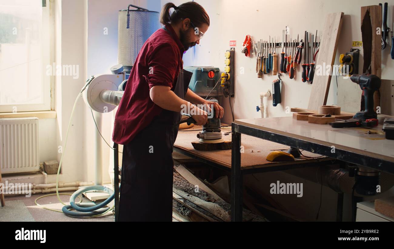 Carpenter giving clipboard with blueprints to assistant, ready to use ...