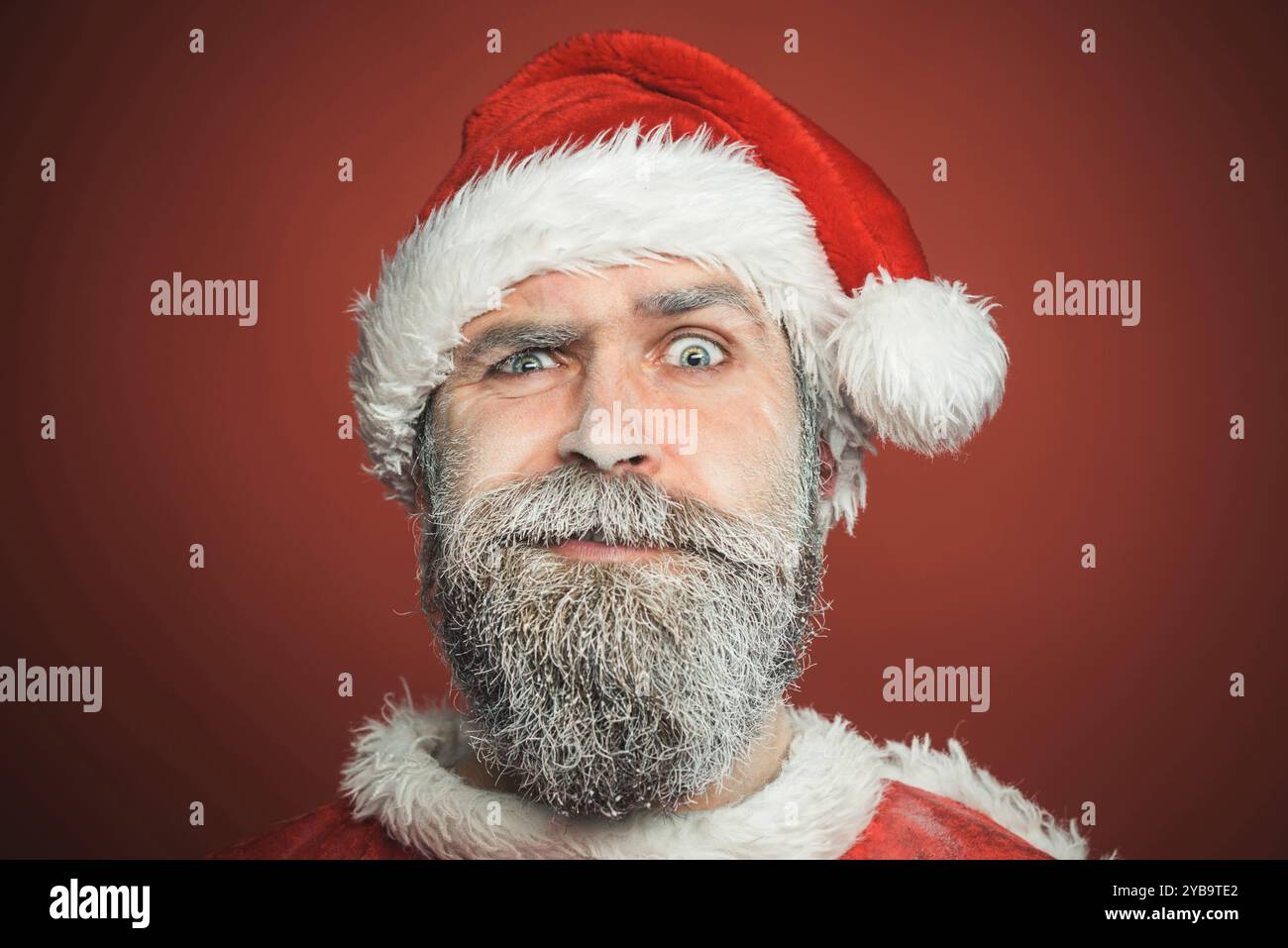 Confused man in santa hat hi-res stock photography and images - Alamy