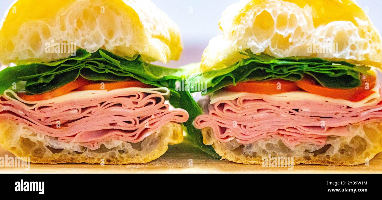 Italian mortadella bologna sandwich with arugula, tomato and cheese on ...
