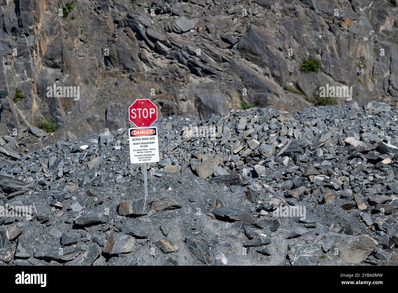 Valdez, Alaska. Sign at the site of a gravel mine where heavy equipment ...