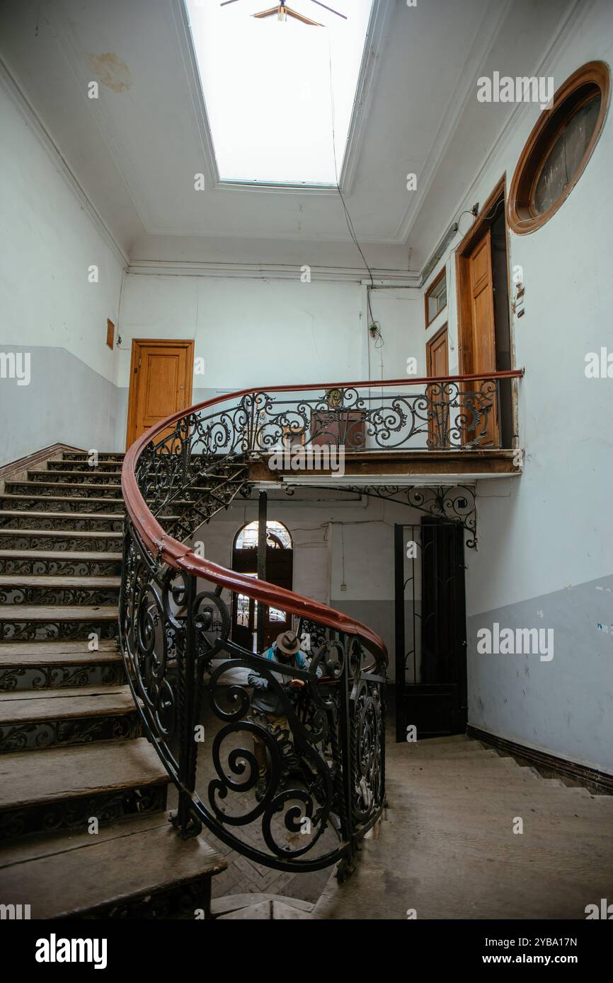 Vintage forged cast iron spiral staircase at the old mansion Stock ...